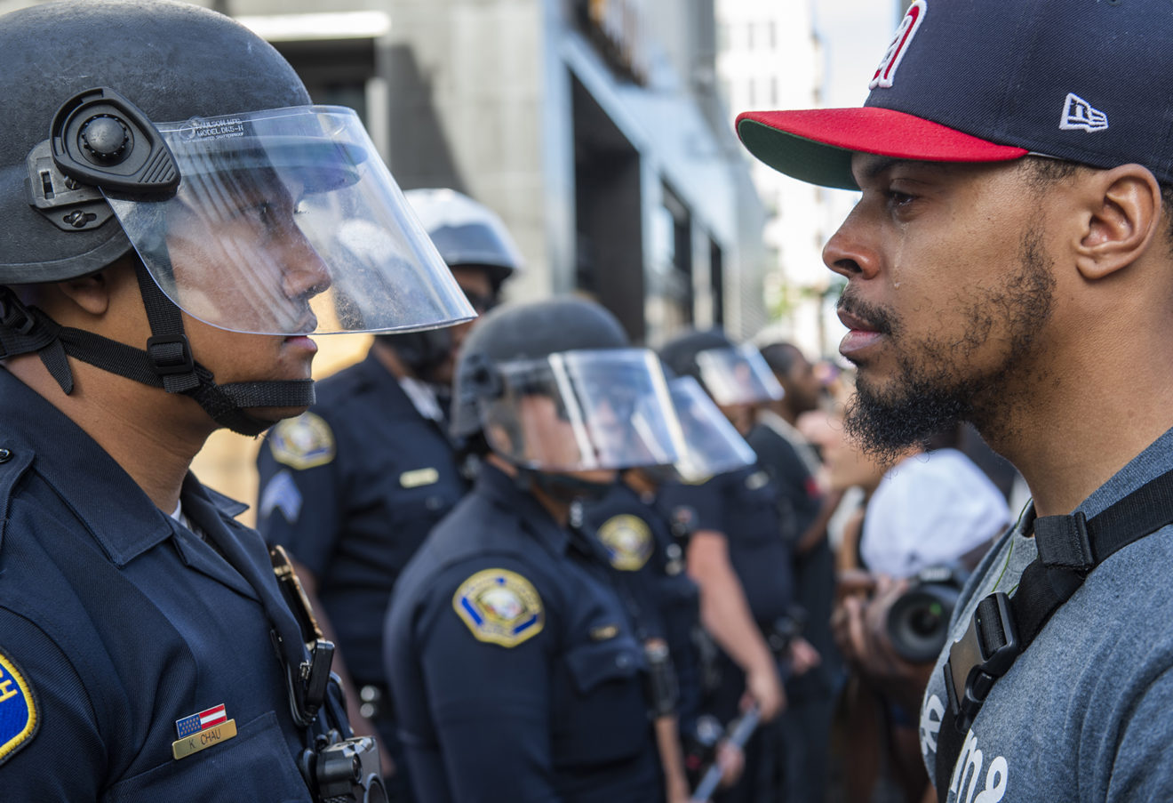 'Trauma is our history': Sunday protester shown shedding a single tear ...