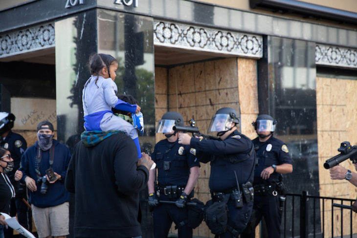 Viral photo from Sunday's protest shows tense scene with police; here's ...