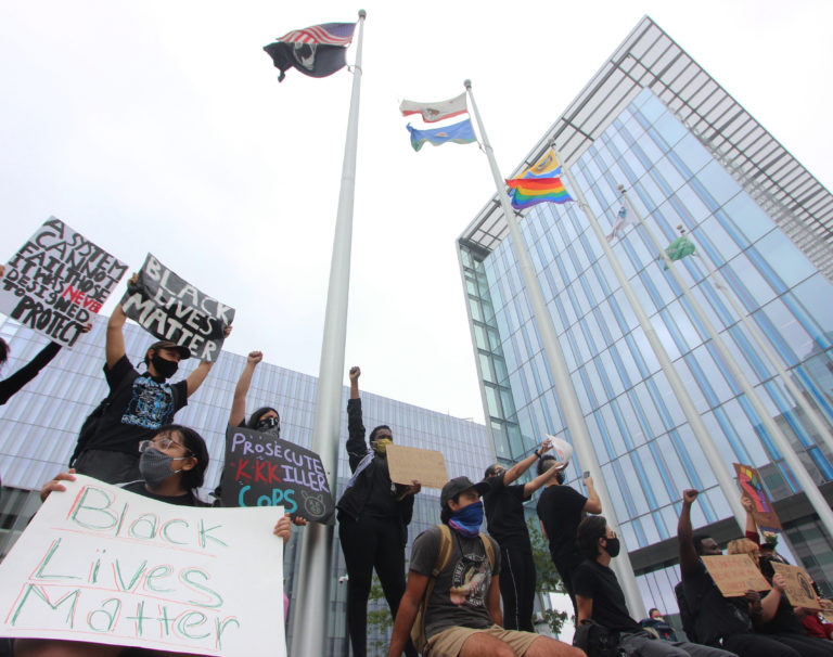 IN PHOTOS: More than 1,000 peaceful protesters marched through Downtown ...