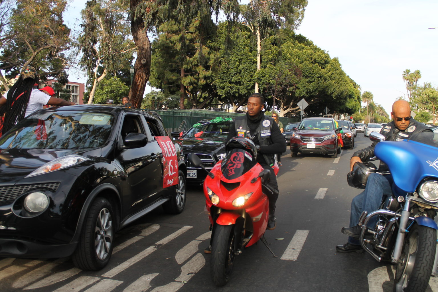 IN PICTURES: Juneteenth motorcade rolls through Bixby Park, ends at ...