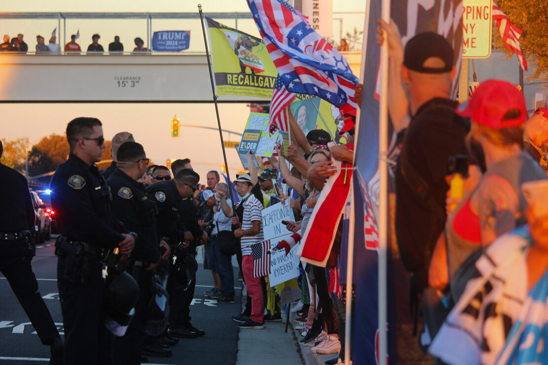 IN PICTURES: Protests, traffic and cheers as President Joe Biden visits ...