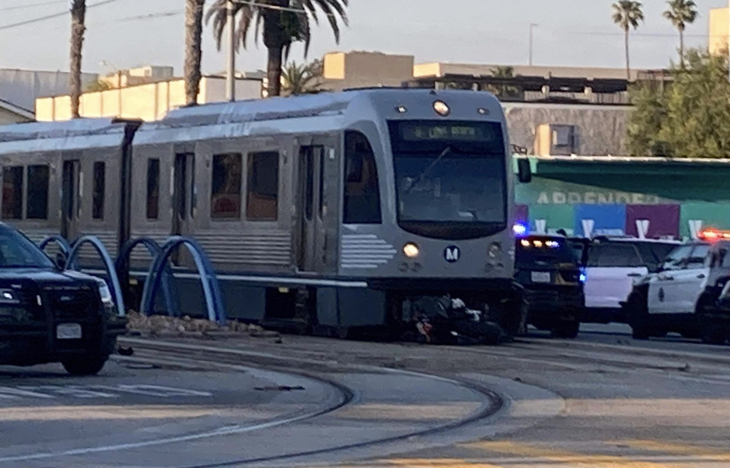 Motorcyclist dead after crashing into car, being hit by Metro train in ...