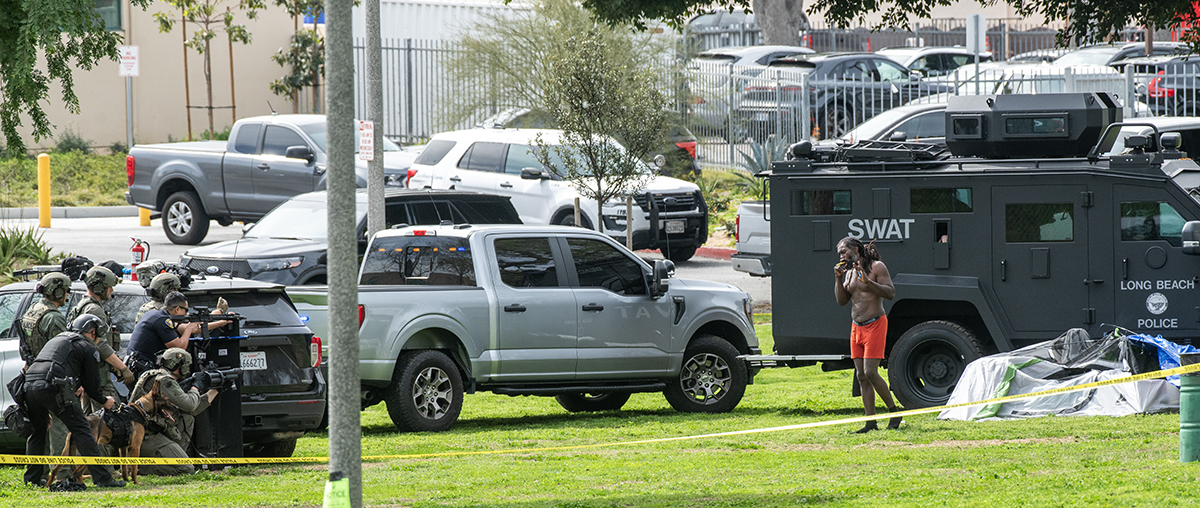 Man in tent surrenders after hours-long SWAT standoff at park ...