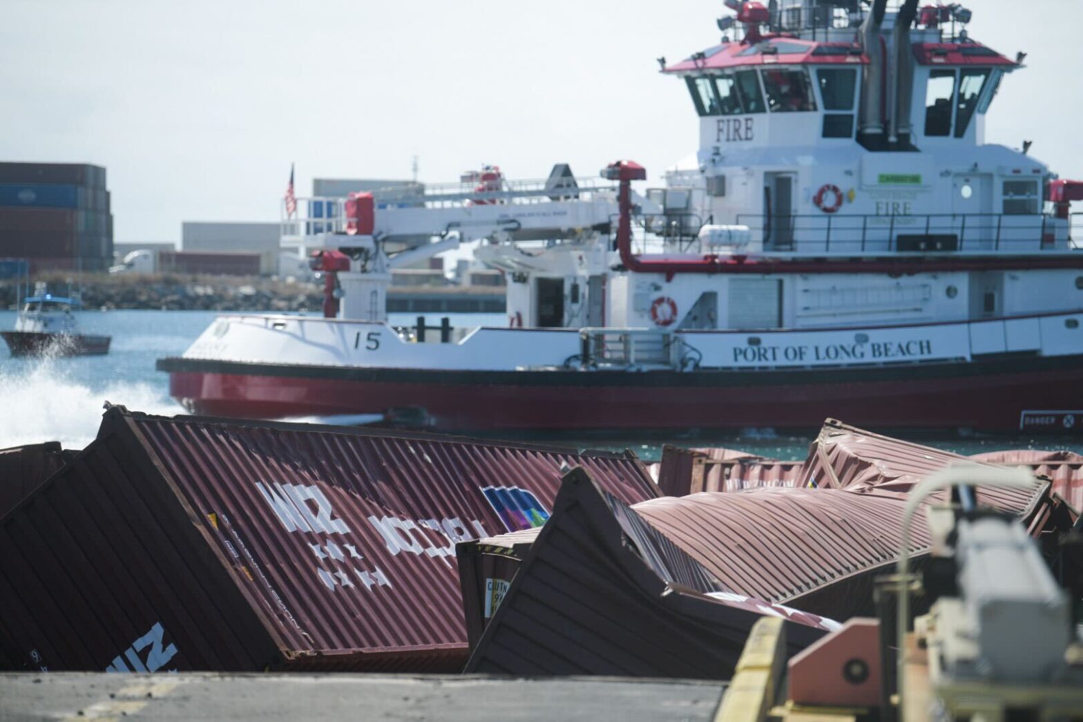Dozens of shipping containers spill from docked vessel at Port of Long ...