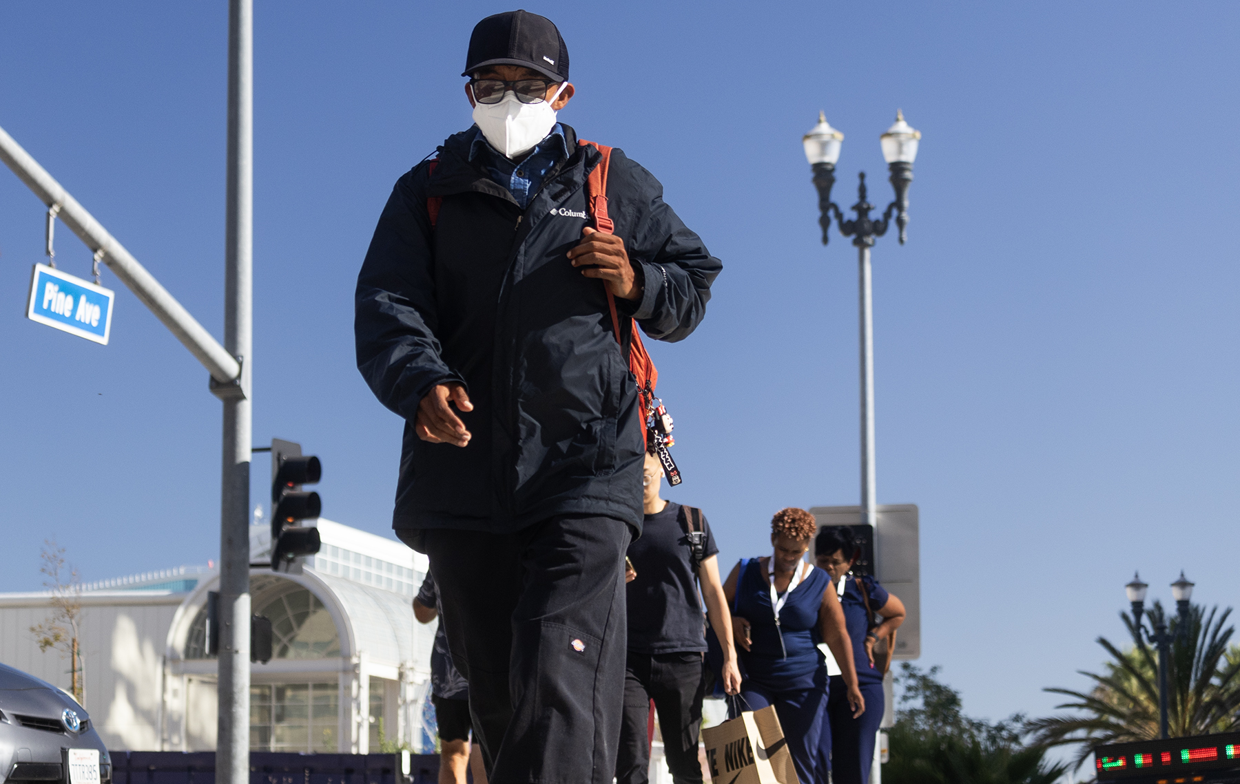 With COVID cases rising, local businesses weigh bringing back masks ...