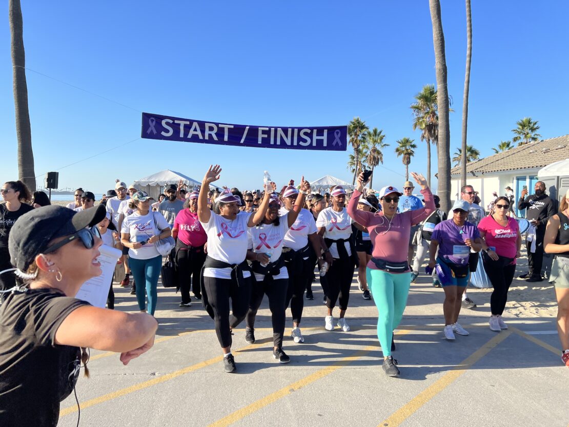 Hundreds of people lined the Long Beach skyline for annual team spirit ...